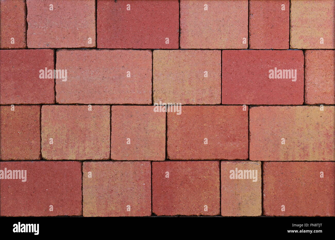 A yellow and red pavement texture Stock Photo - Alamy