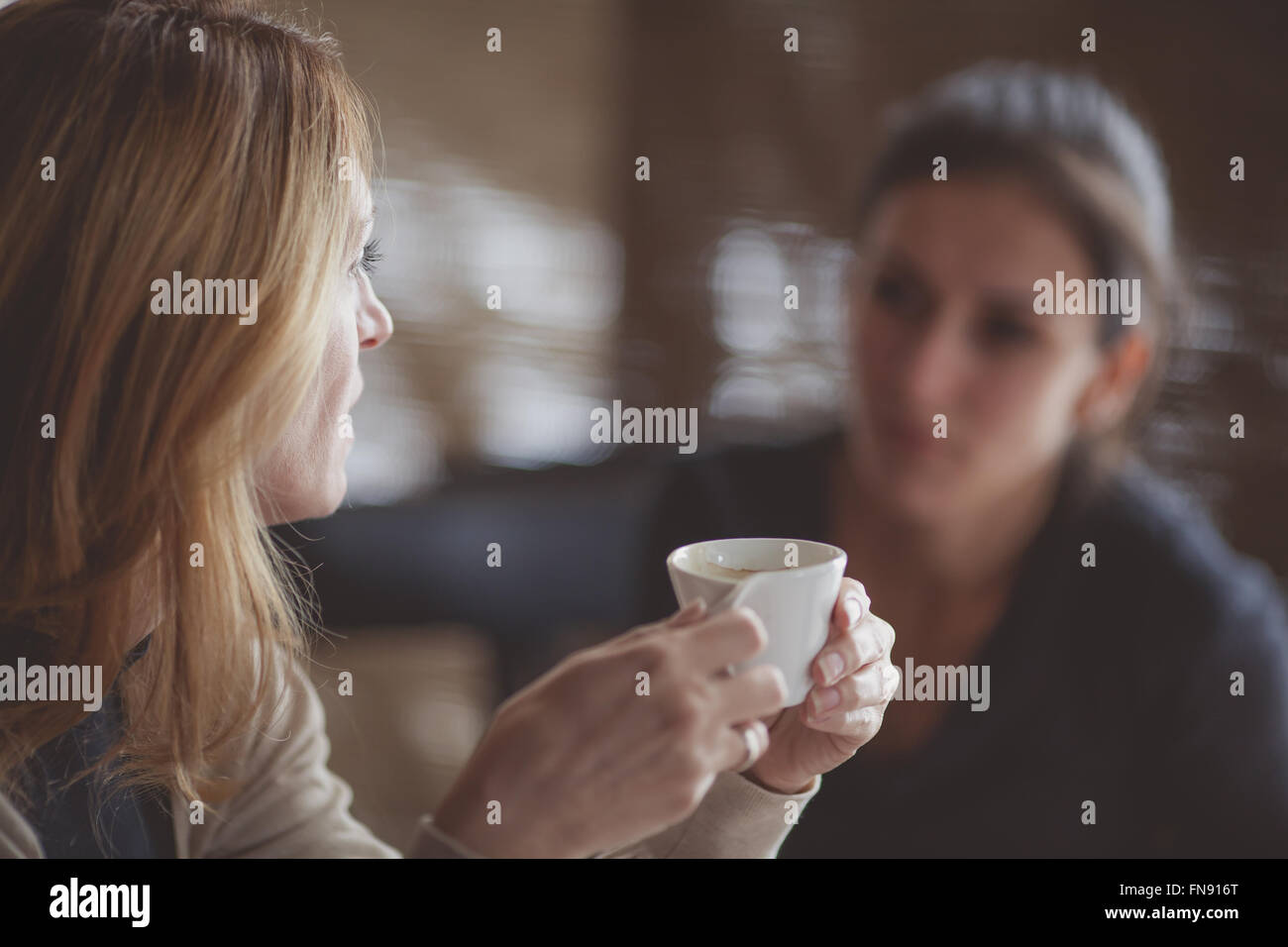 Women with coffee hi-res stock photography and images - Alamy