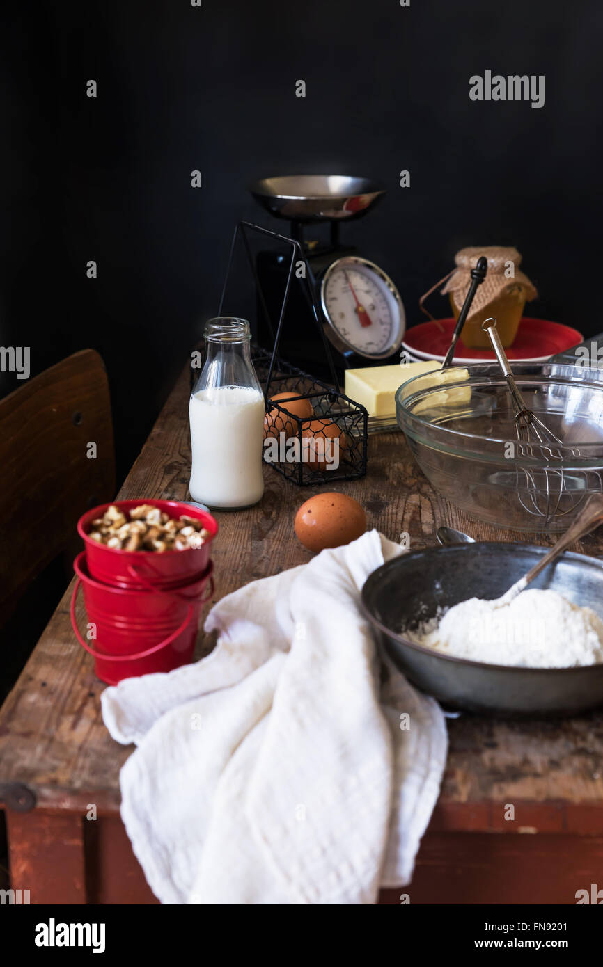 Baking ingredients on a table Stock Photo - Alamy