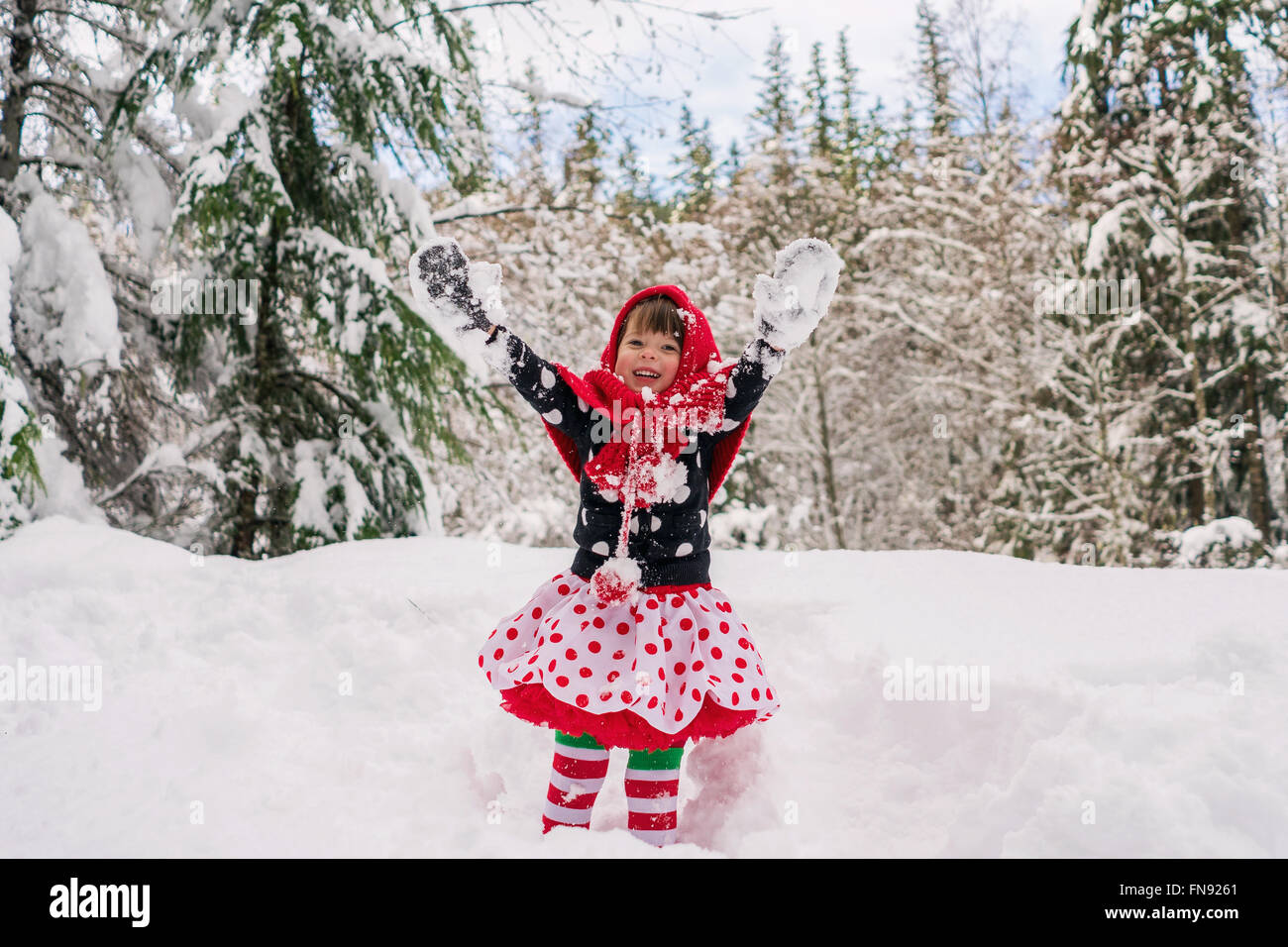 Girl throwing snow in air hi-res stock photography and images - Alamy