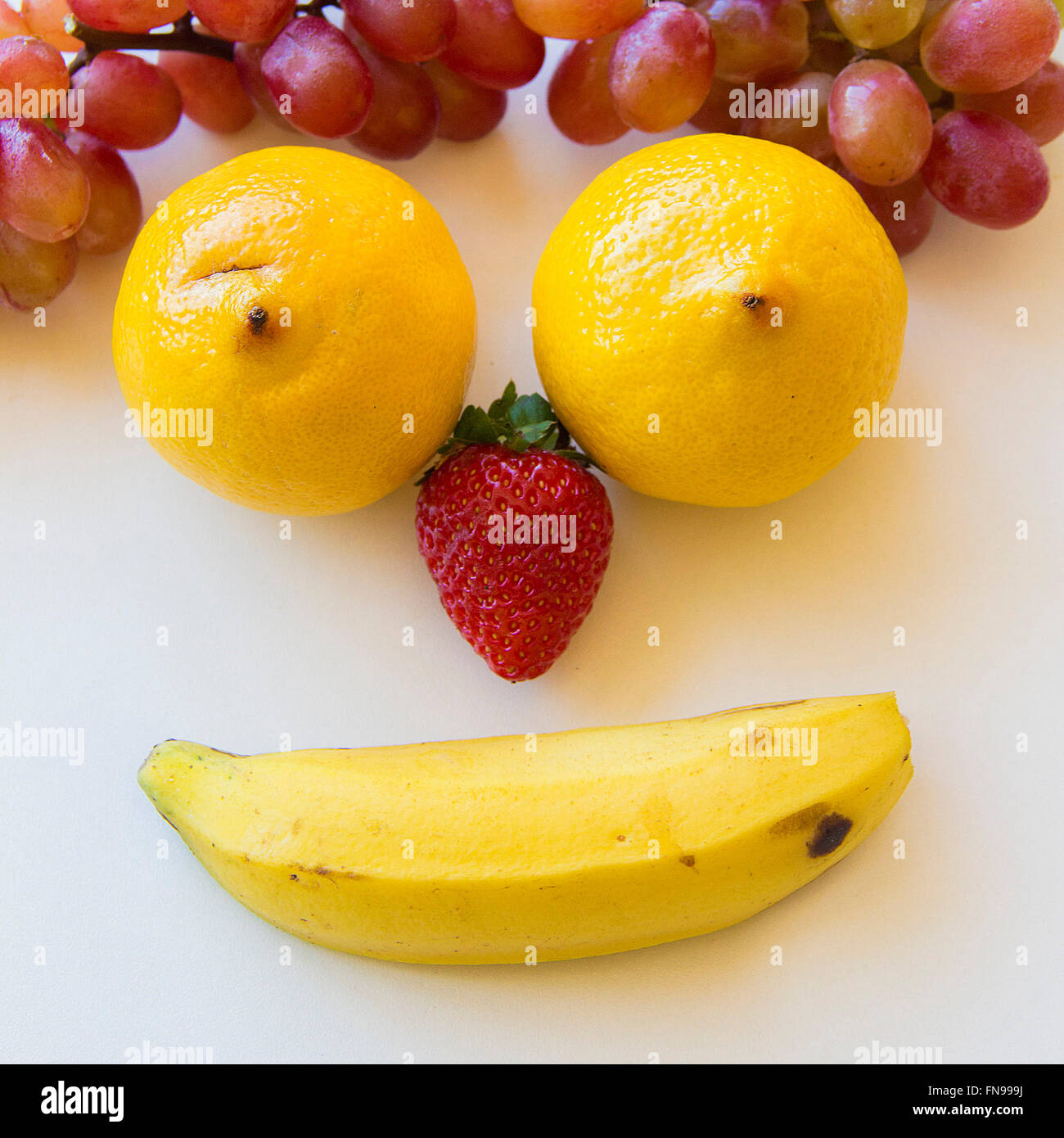 Fruits in the shape of a face Stock Photo - Alamy