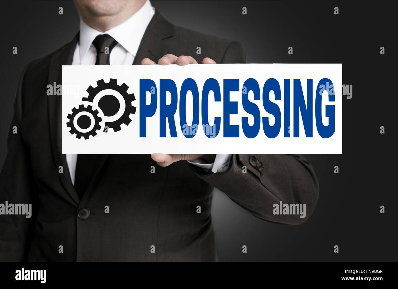 processing only sign is held by businessman Stock Photo - Alamy