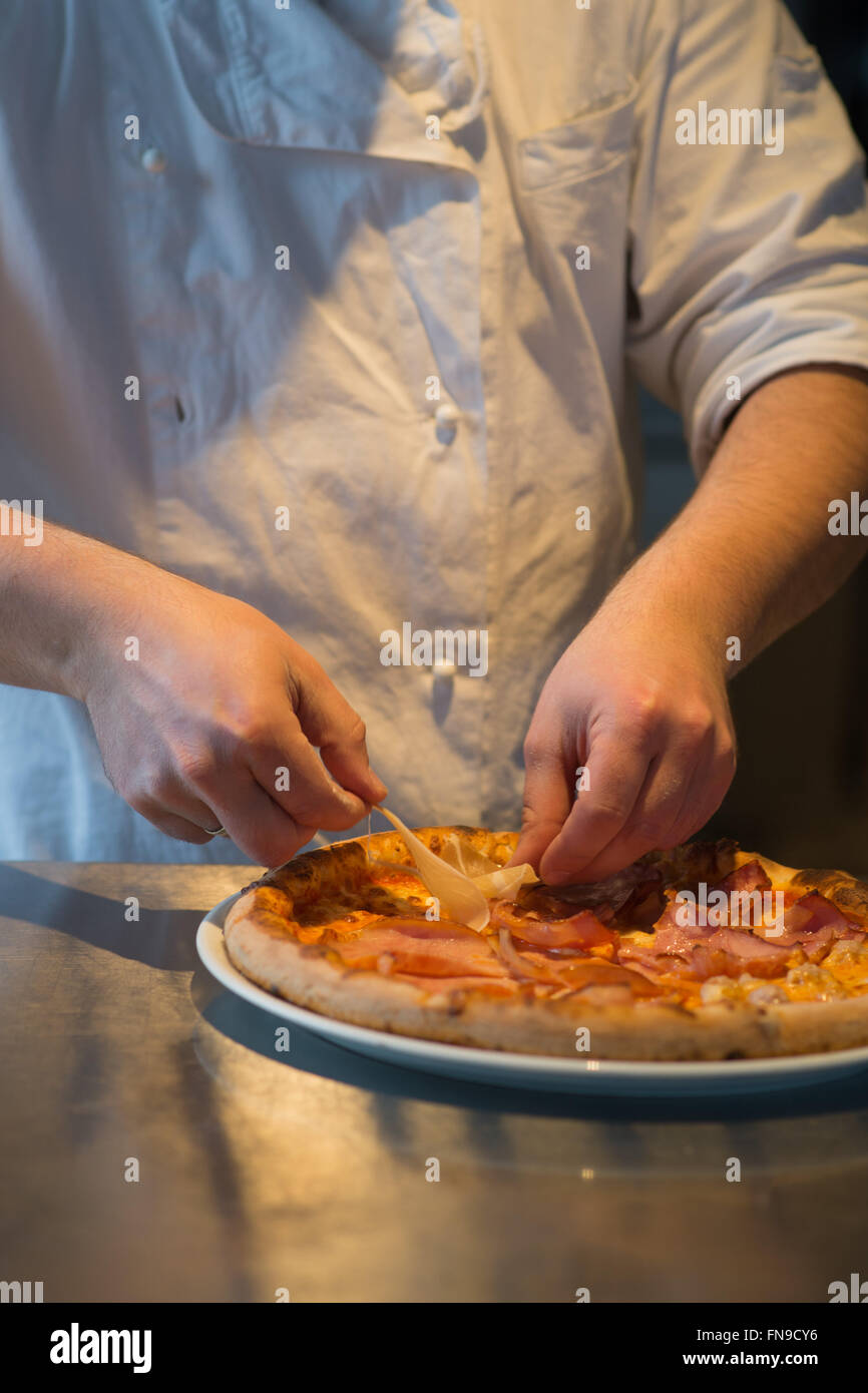 Making pizza hi-res stock photography and images - Alamy