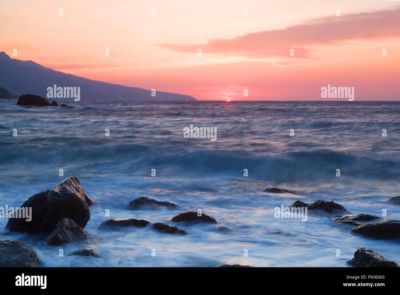 Sunrise over stones hi-res stock photography and images - Alamy