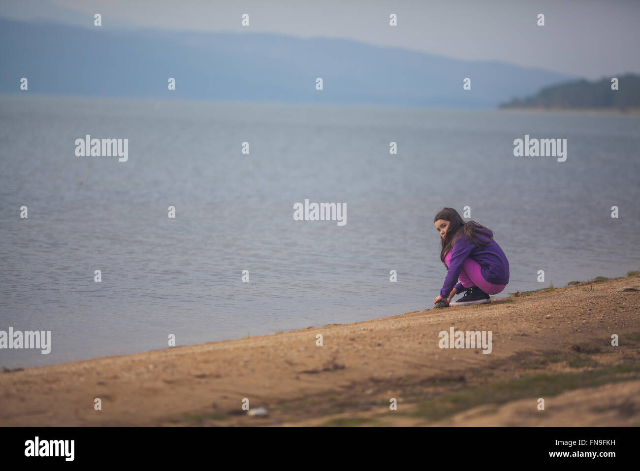 Crouching Down Stock Photos & Crouching Down Stock Images - Alamy