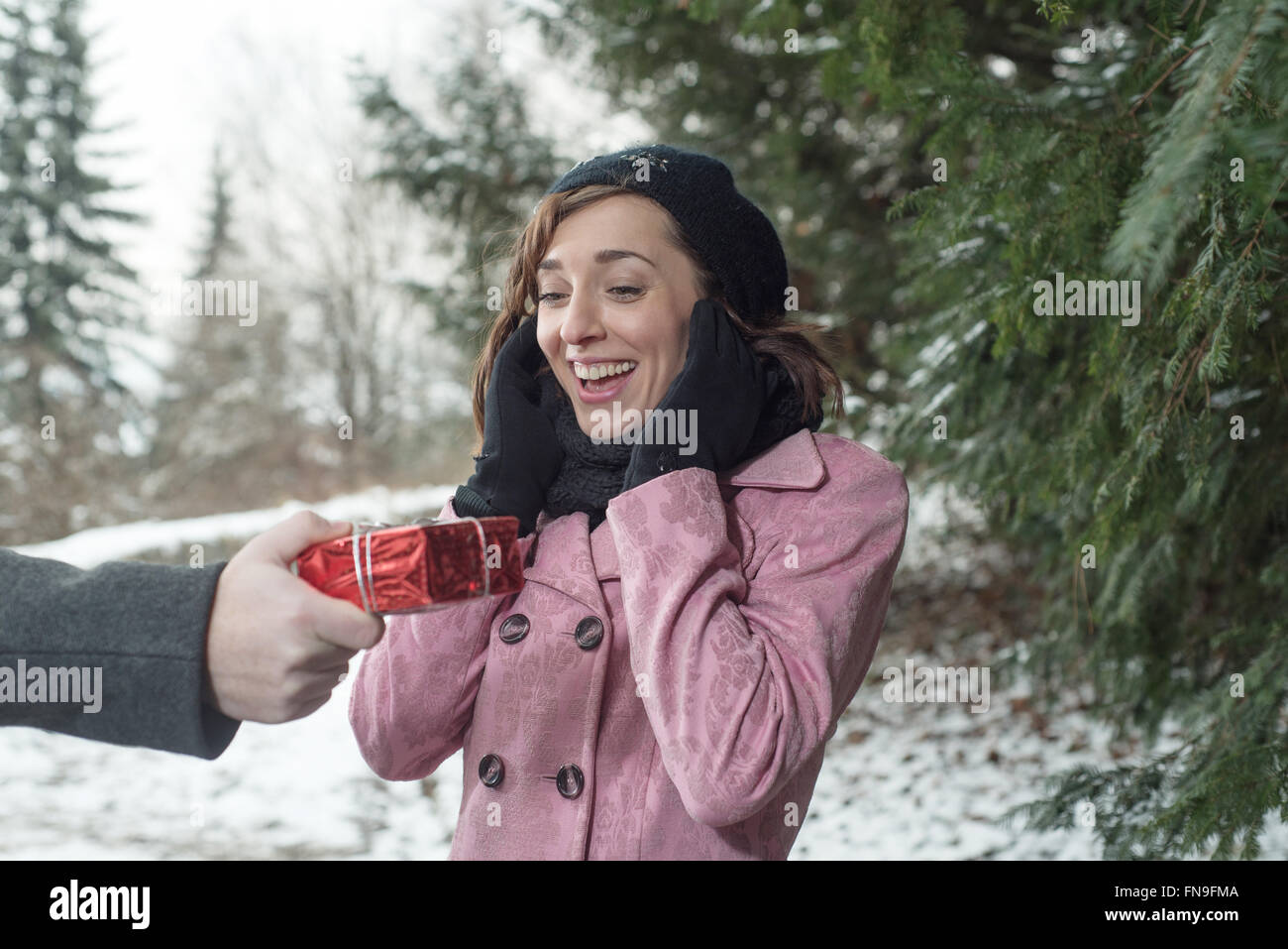 Woman receiving a gift Stock Photo - Alamy
