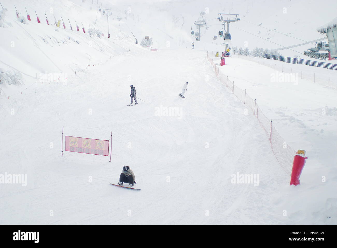 Three men snowboarding, Sierra Nevada, Granada, Spain Stock Photo - Alamy