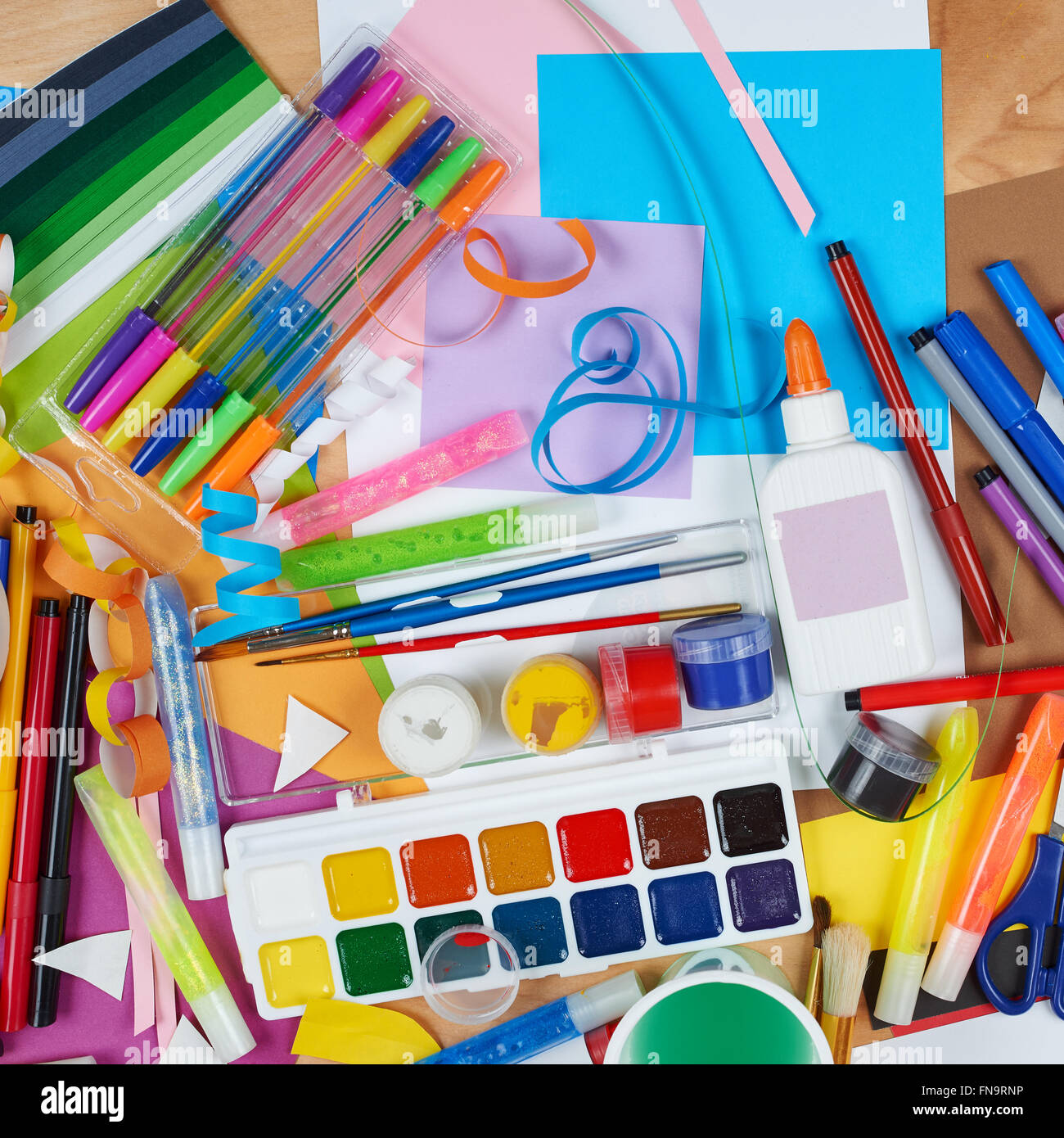 artwork workplace with creative accessories, art tools for painting and ...