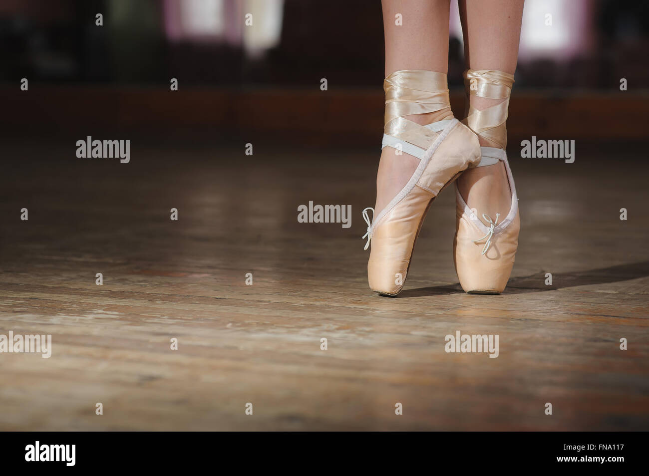 Young ballerina or dancer girl dancing, closeup on legs and shoes ...