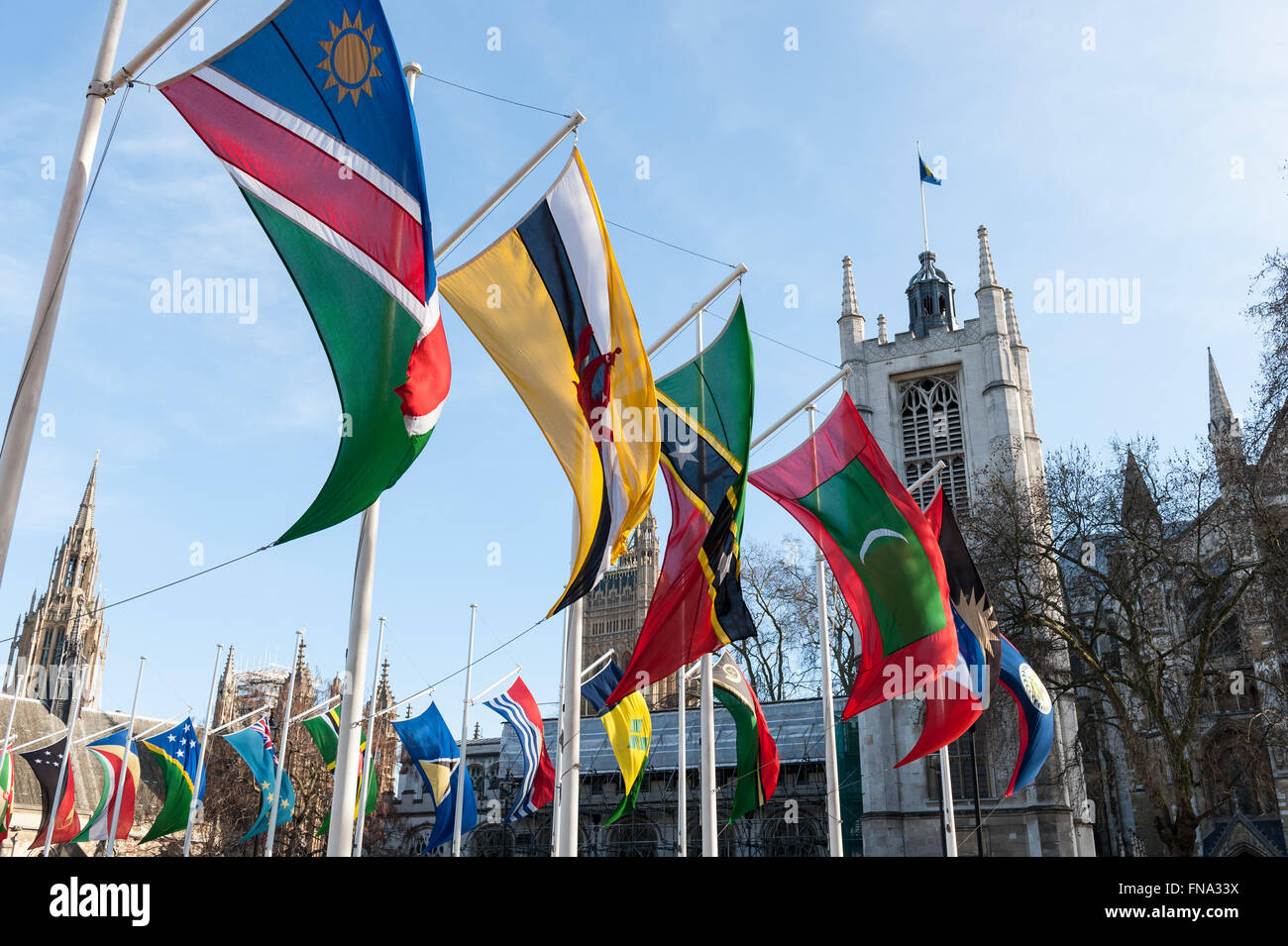 London, UK. 14 March 2016. Flags of the Commonwealth flutter in the ...