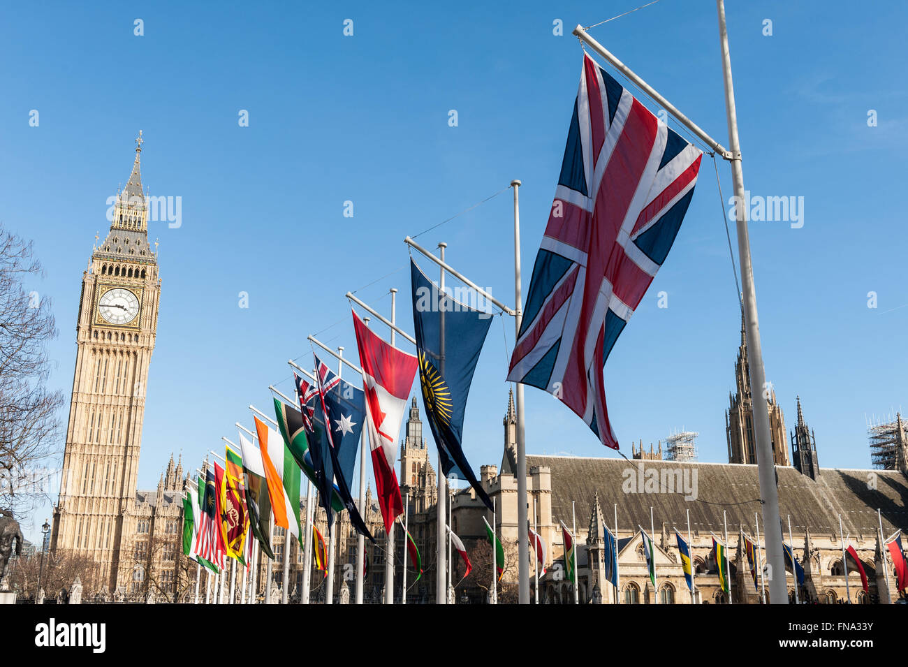 London, UK. 14 March 2016. Flags of the Commonwealth flutter in the ...