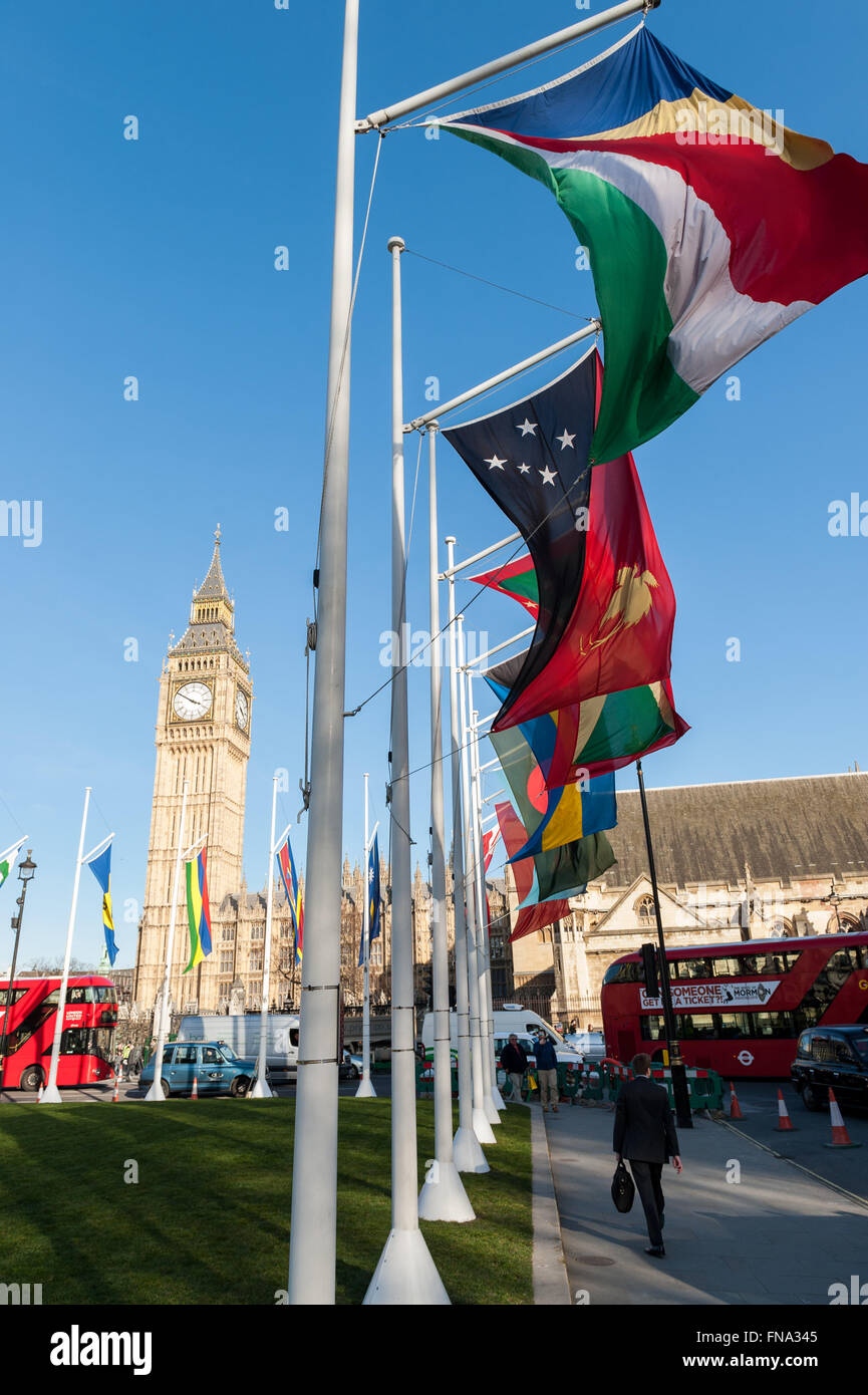 London, UK. 14 March 2016. Flags of the Commonwealth flutter in the ...