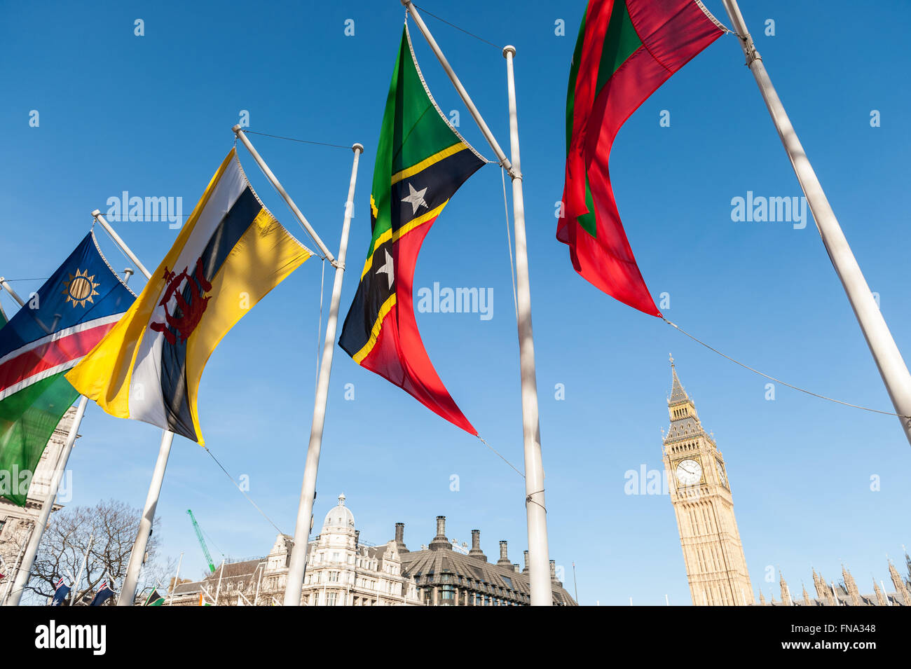 London, UK. 14 March 2016. Flags of the Commonwealth flutter in the ...