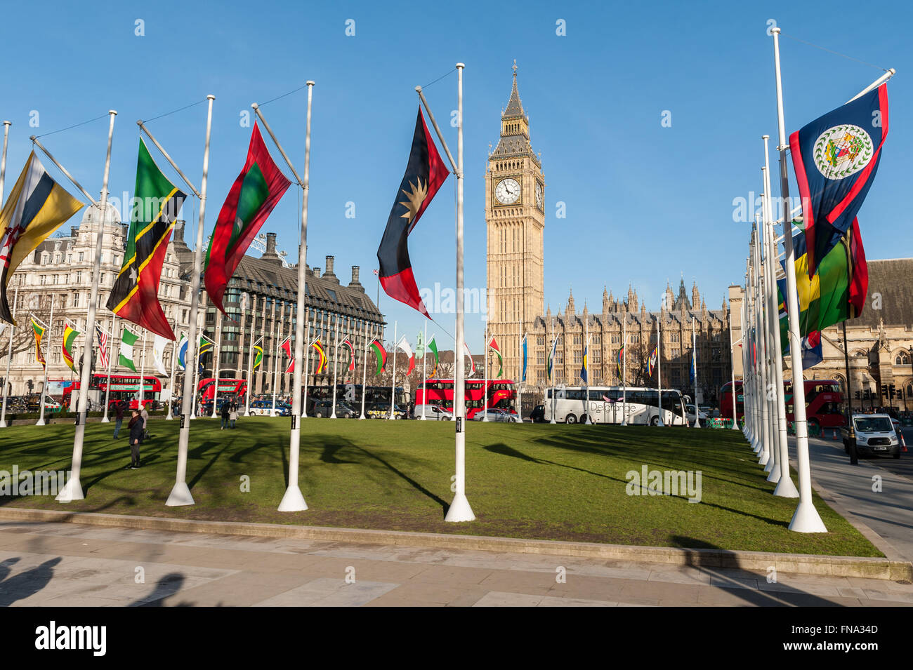 London, UK. 14 March 2016. Flags of the Commonwealth flutter in the ...