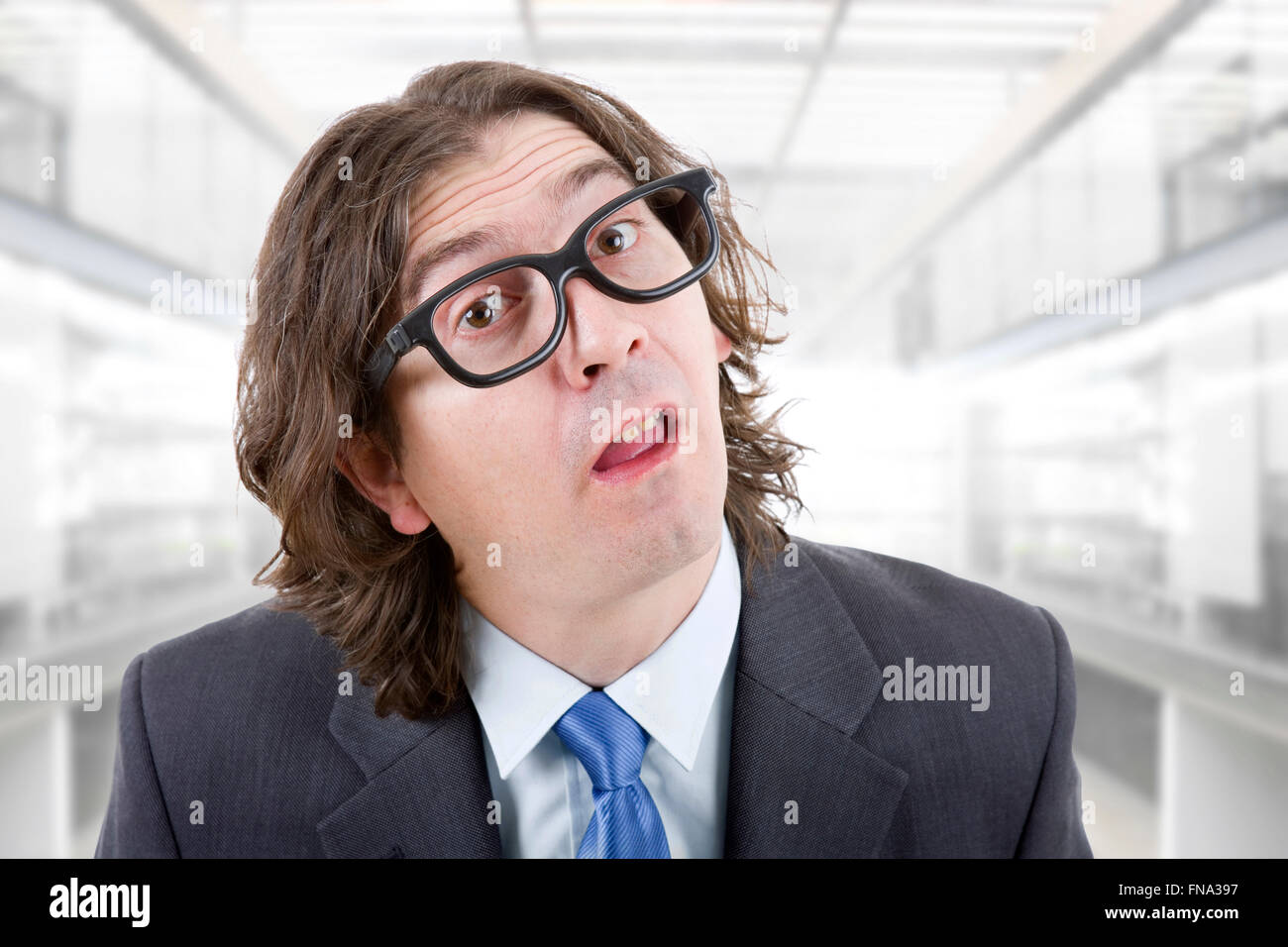 young silly business man at the office Stock Photo - Alamy