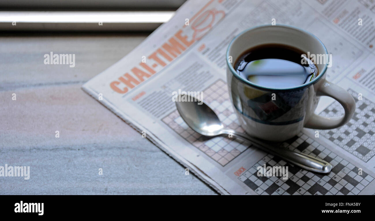 Tea with newspaper Stock Photo - Alamy