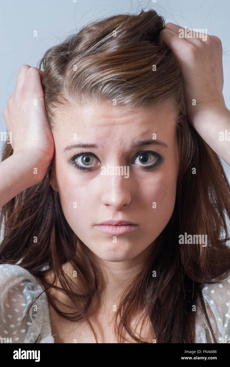 Young woman with Anisocoria and Horner's Syndrome Stock Photo - Alamy