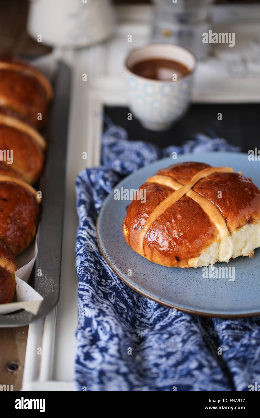 Hot cross buns on a breakfast table Stock Photo - Alamy