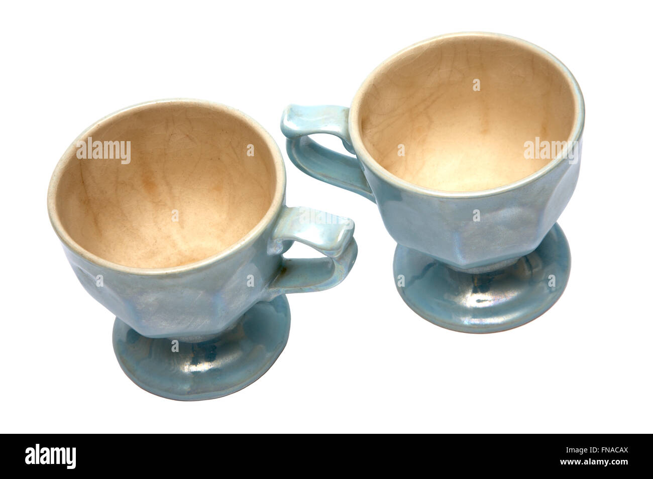 Two beautiful cups on a white background Stock Photo - Alamy