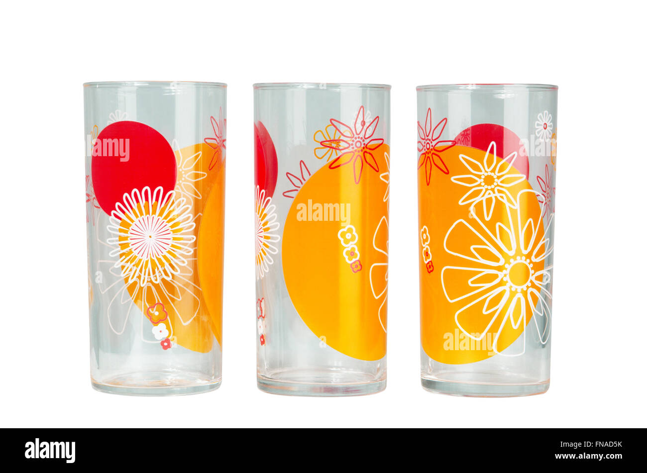 Three glasses with figure on a white background Stock Photo - Alamy