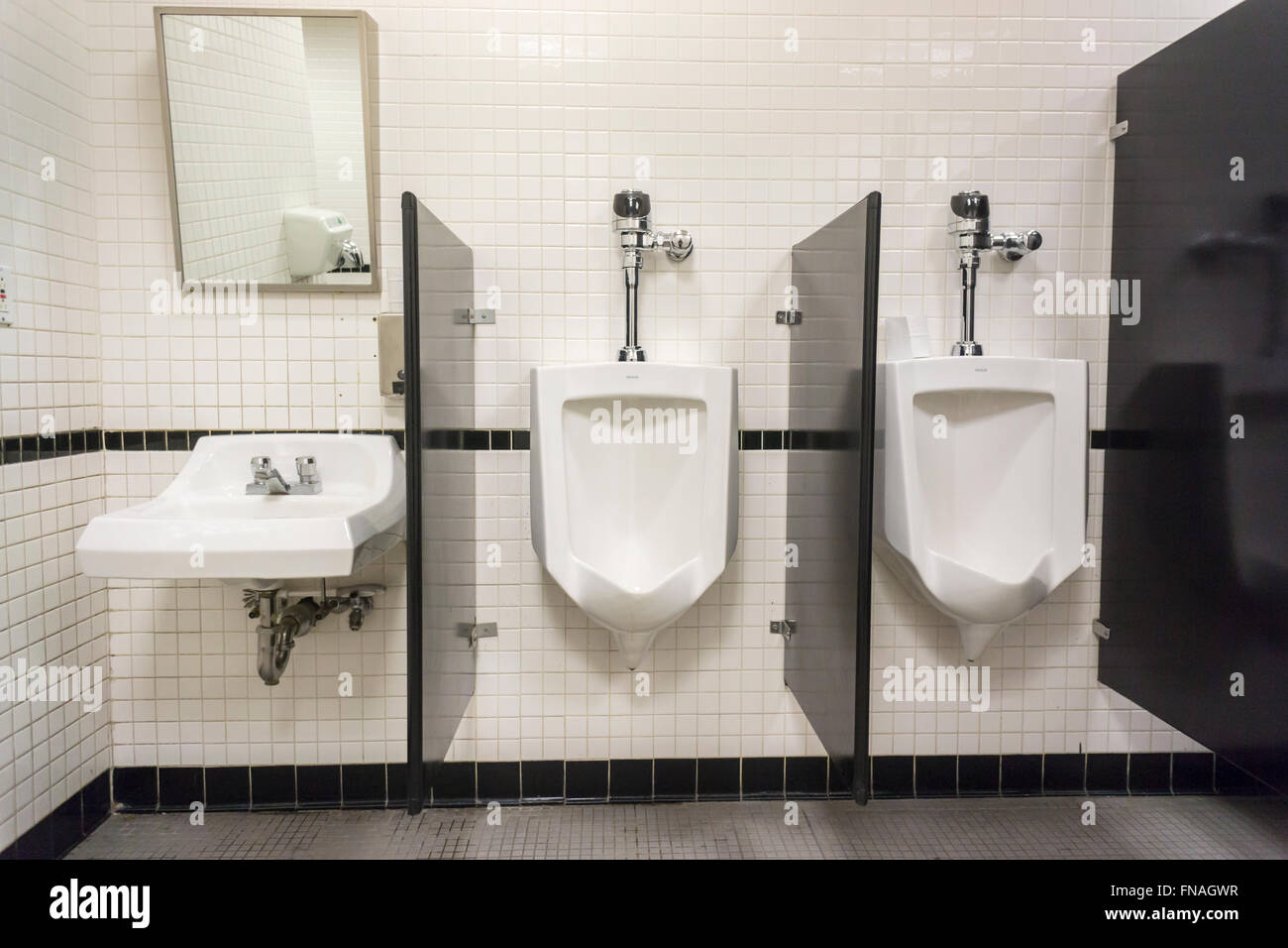 Urinals await customers in a restroom in New York on Sunday, March 6 ...