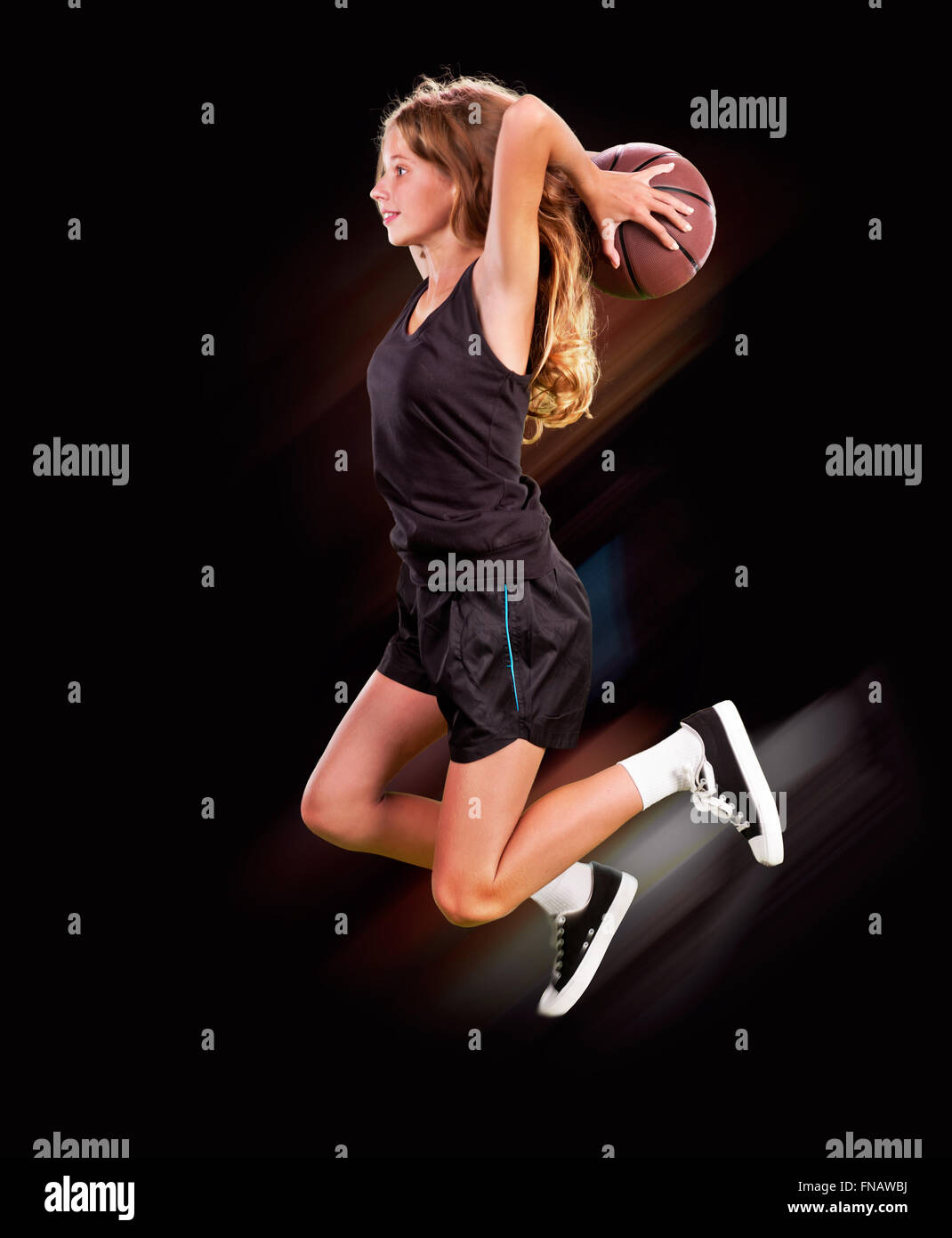 Female teenage basketball player hi-res stock photography and images ...