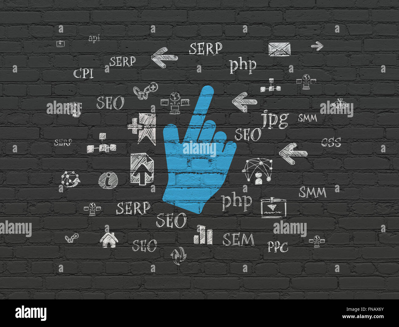 Web development concept: Painted blue Mouse Cursor icon on Black Brick wall background with Hand ...
