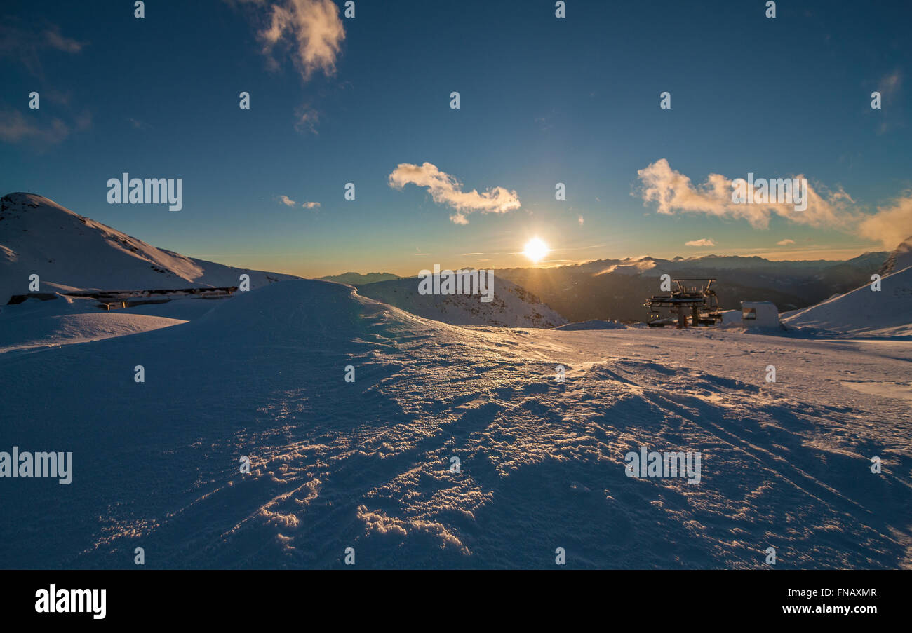 Sunset mountains snow hi-res stock photography and images - Alamy