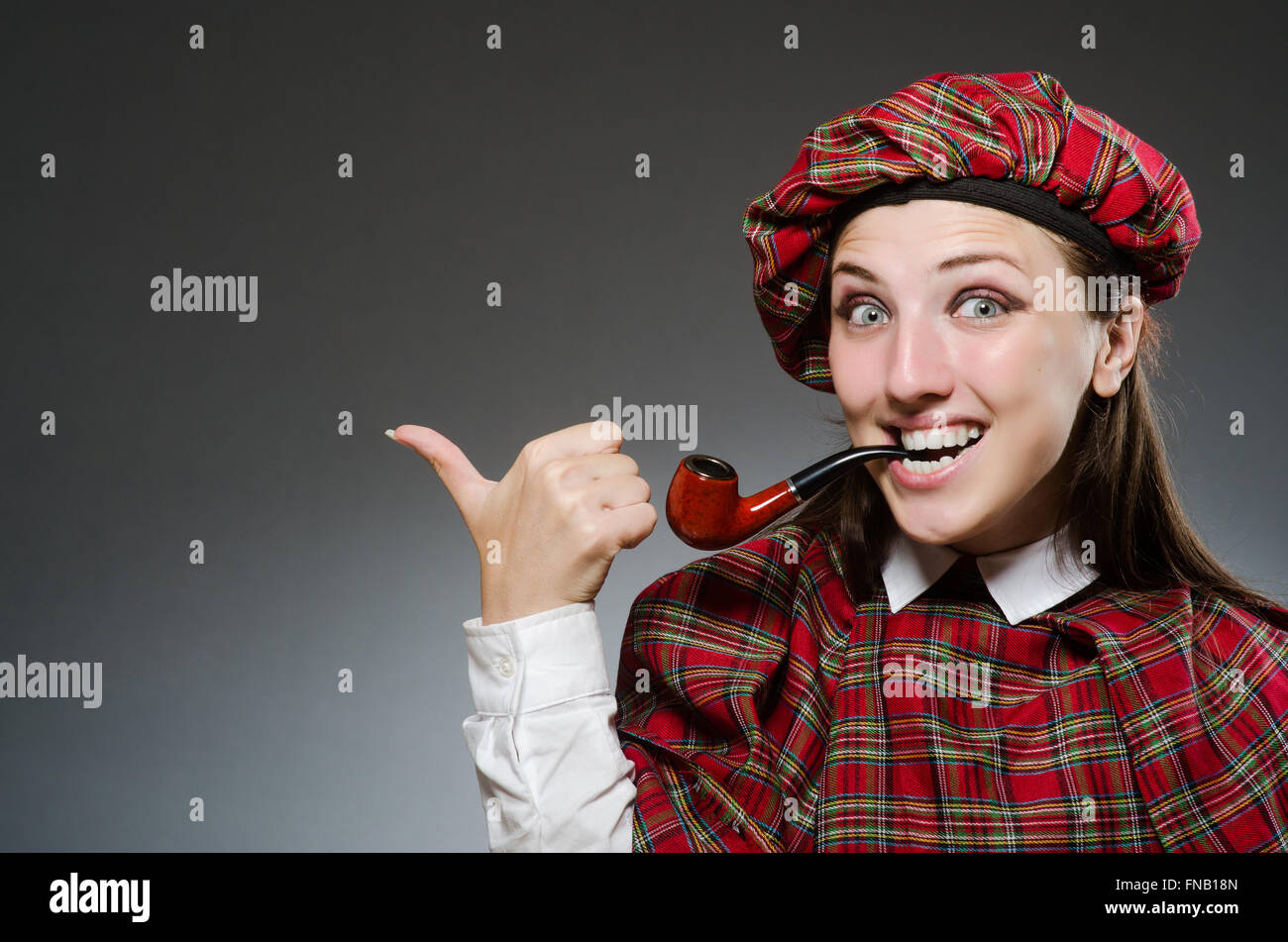 Woman wearing traditional scottish clothing Stock Photo - Alamy