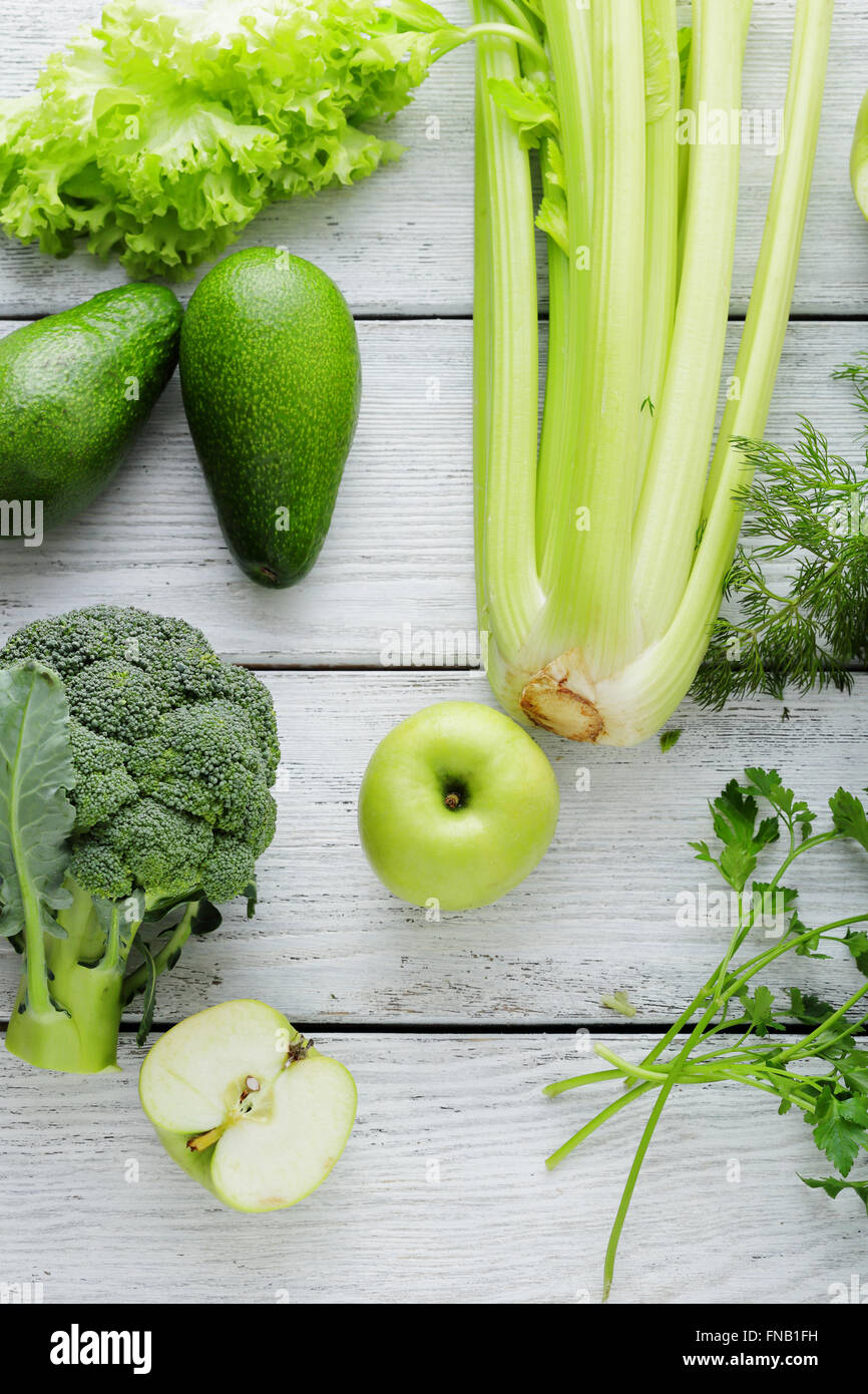 green color vegetables on white rustic boards, top view Stock Photo - Alamy