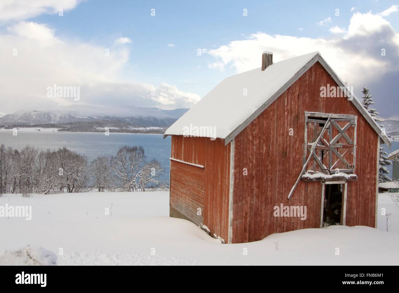 Scandinavian barn in the snow, Tromso Stock Photo - Alamy
