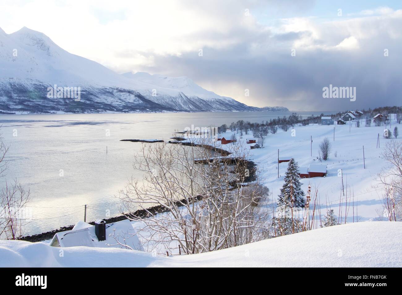 Village in Tromso by the river Stock Photo - Alamy