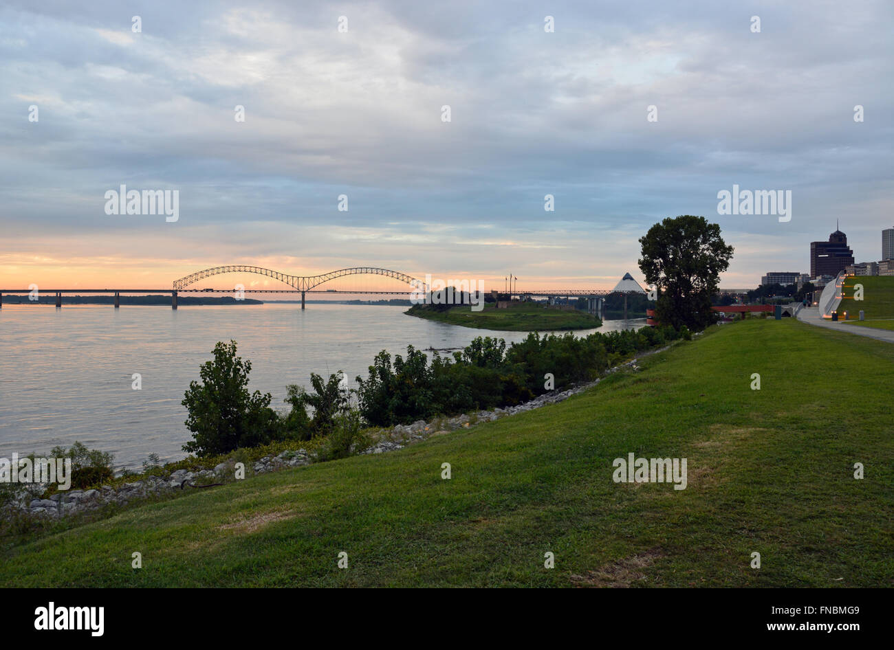 Sunset over the I-40 bridge over the Mississippi River leading to ...