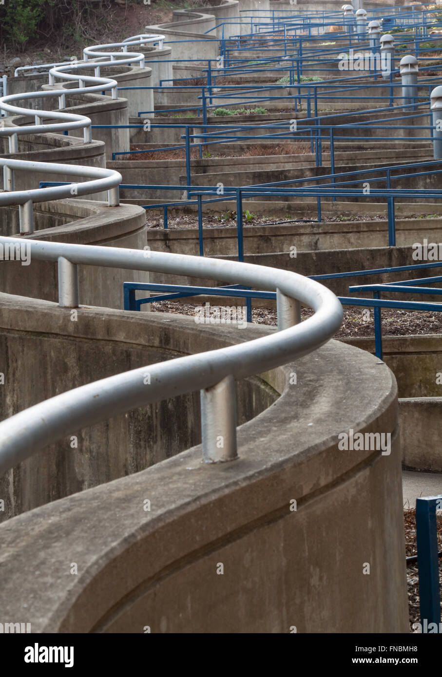 stairs and walkways with blue railing Stock Photo - Alamy