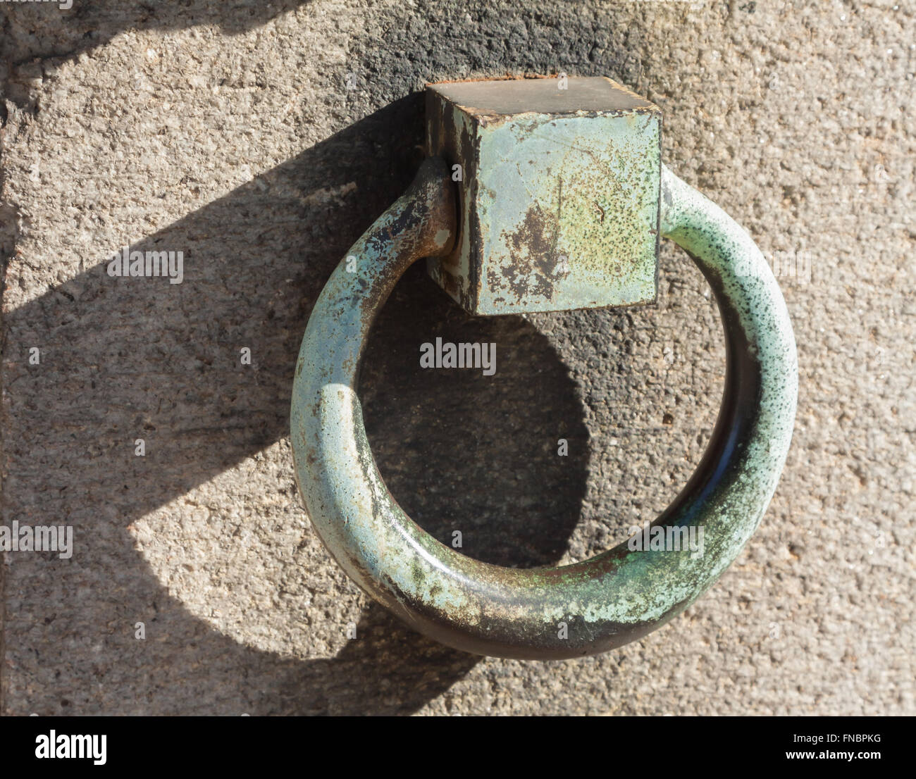 ornamental weathered metal door knockers Stock Photo - Alamy