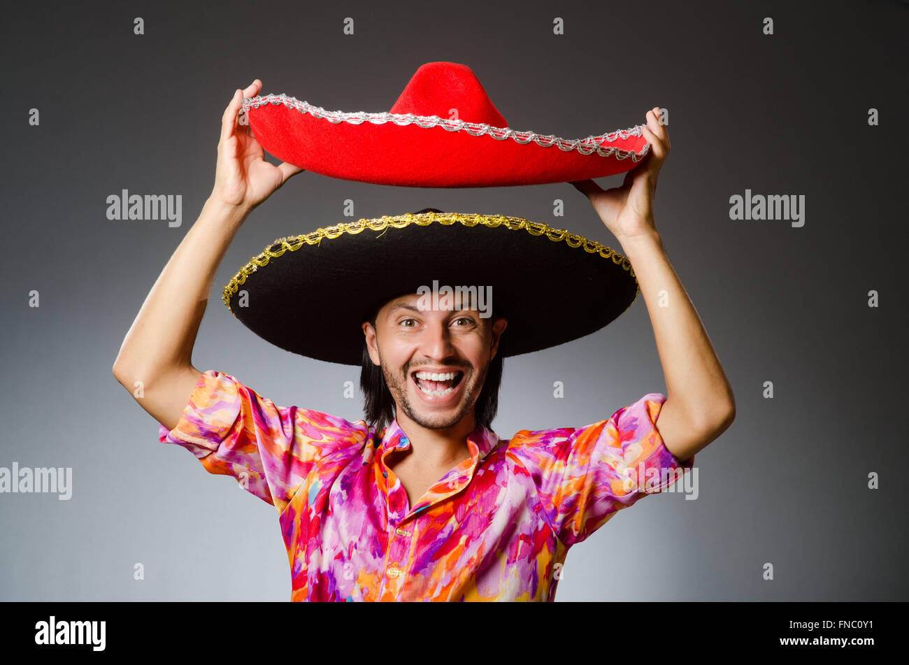 Young mexican man wearing sombrero Stock Photo - Alamy