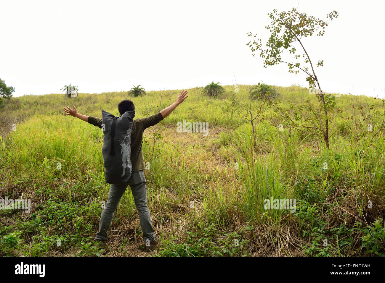 man standing with hands up /Future / freedom / hope / success concept ...