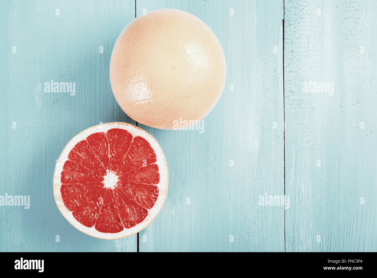 Retro Effect Of Fresh Red Grapefruit Slice Stock Photo - Alamy