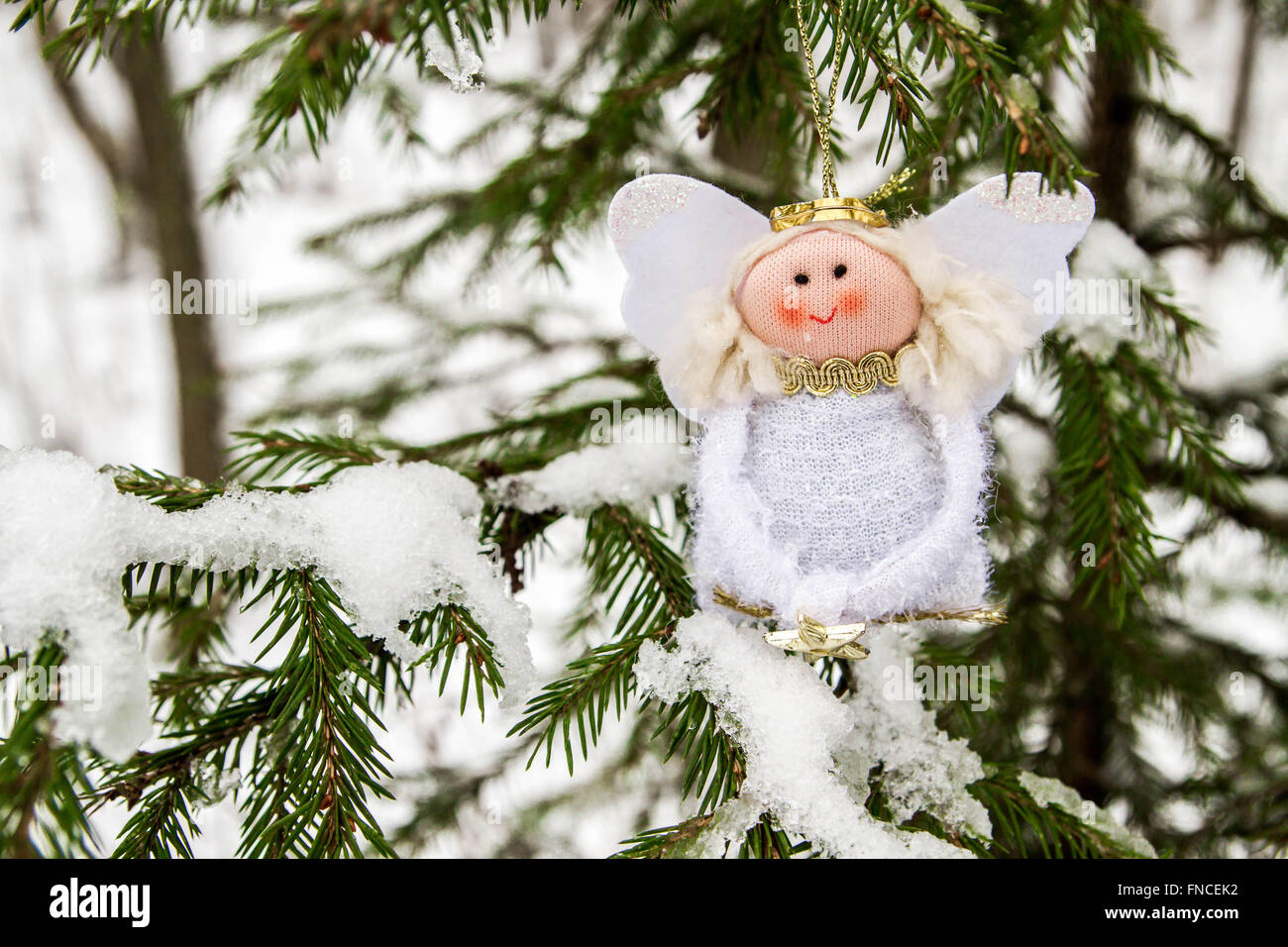 The angel on the Christmas tree Stock Photo - Alamy