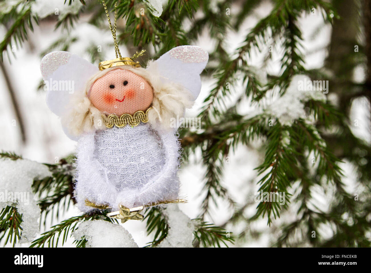 The angel on the Christmas tree Stock Photo - Alamy