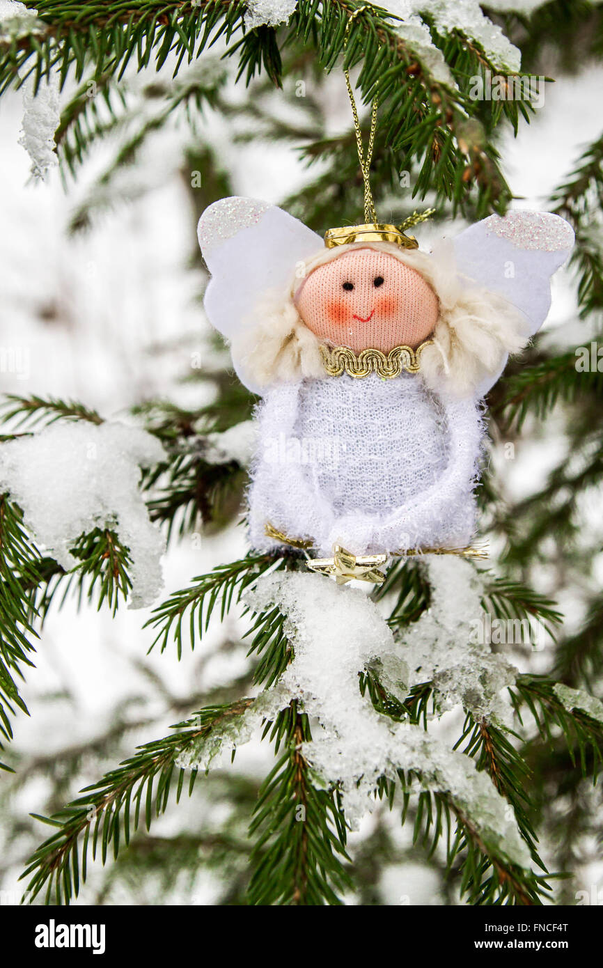 The angel on the Christmas tree Stock Photo - Alamy