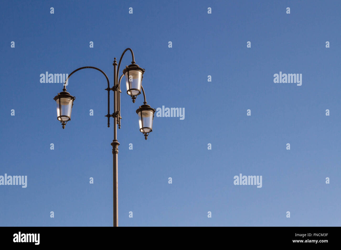 Street lamp post in three shades Stock Photo - Alamy