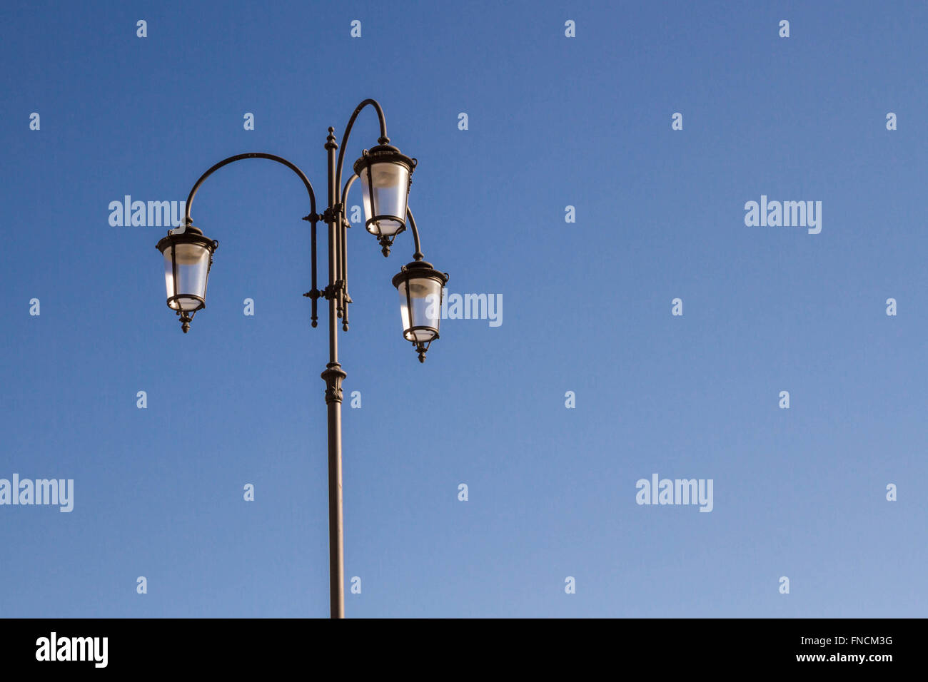 Street lamp post in three shades Stock Photo - Alamy