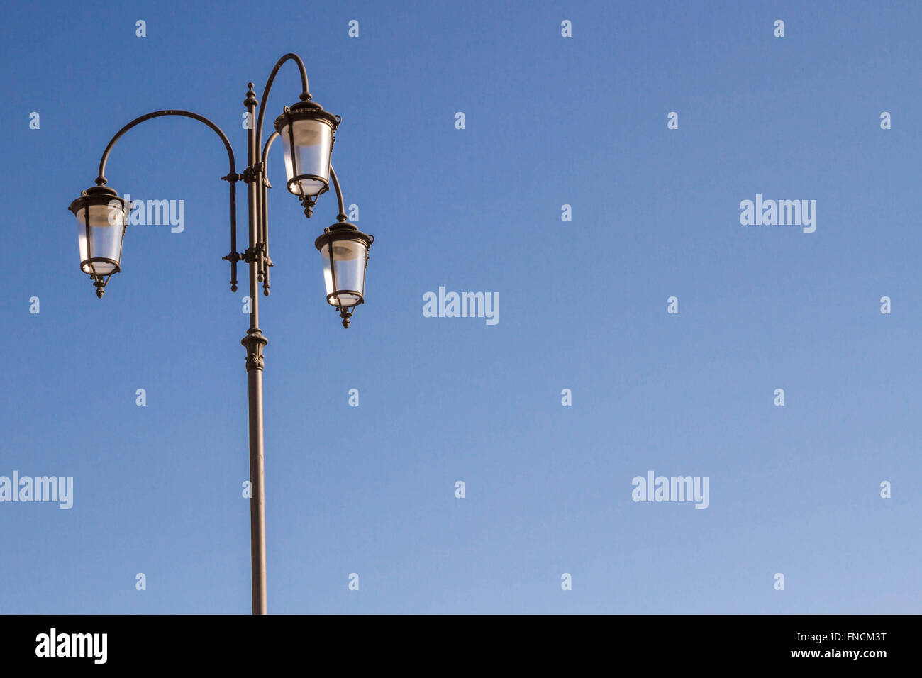 Street lamp post in three shades Stock Photo - Alamy
