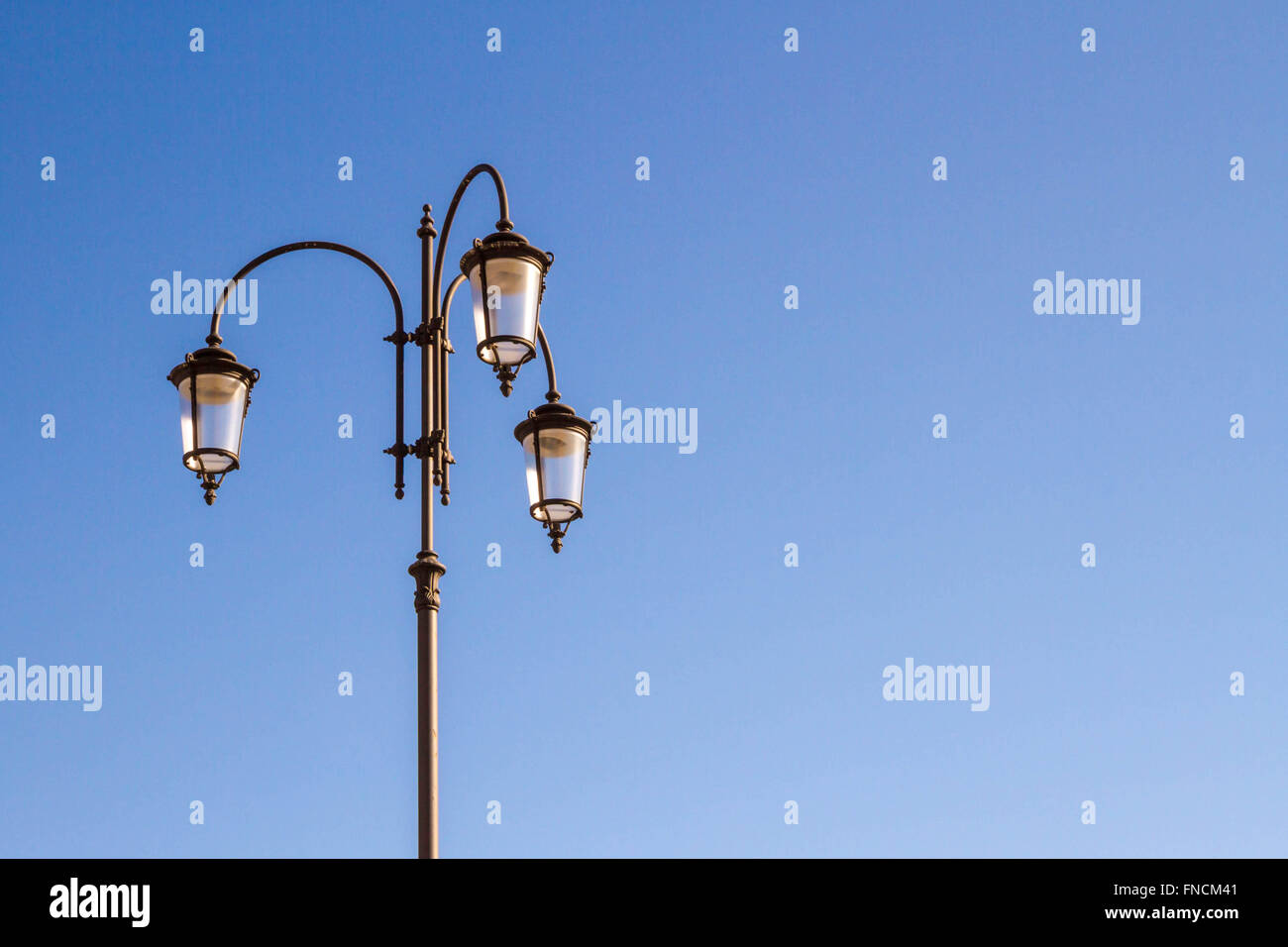 Street lamp post in three shades Stock Photo - Alamy