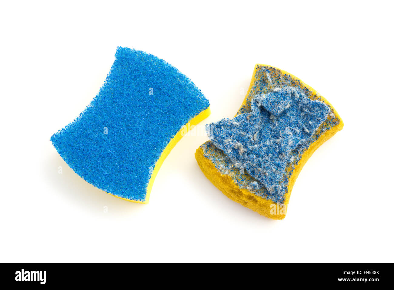 top view new & old double-side cleaning sponge on a white background ...