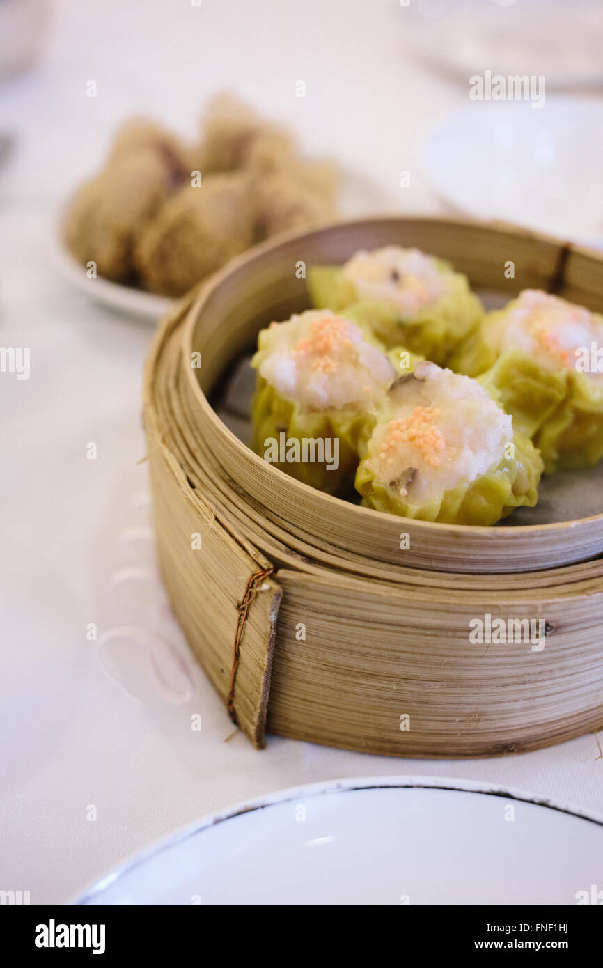 Siu mai/shumai Chinese steamed dumplings in a bamboo steamer,Chinese ...