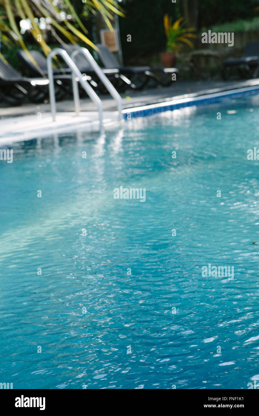 Shimmering swimming pool water at luxury resort in Penang, Malaysia ...