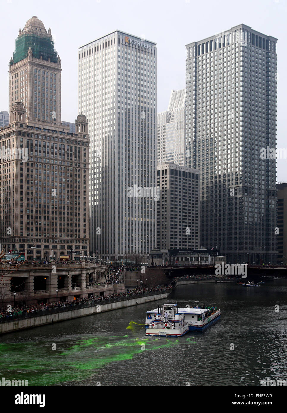 The Chicago River is dyed green by members of the plumbers union in ...