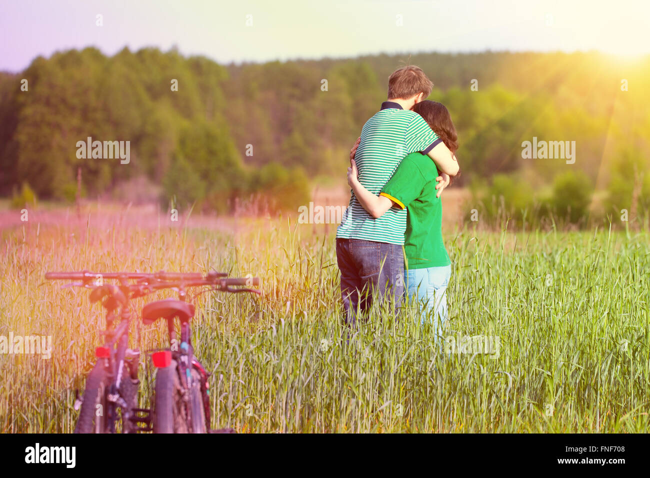 Happy couple spring field hi-res stock photography and images - Alamy